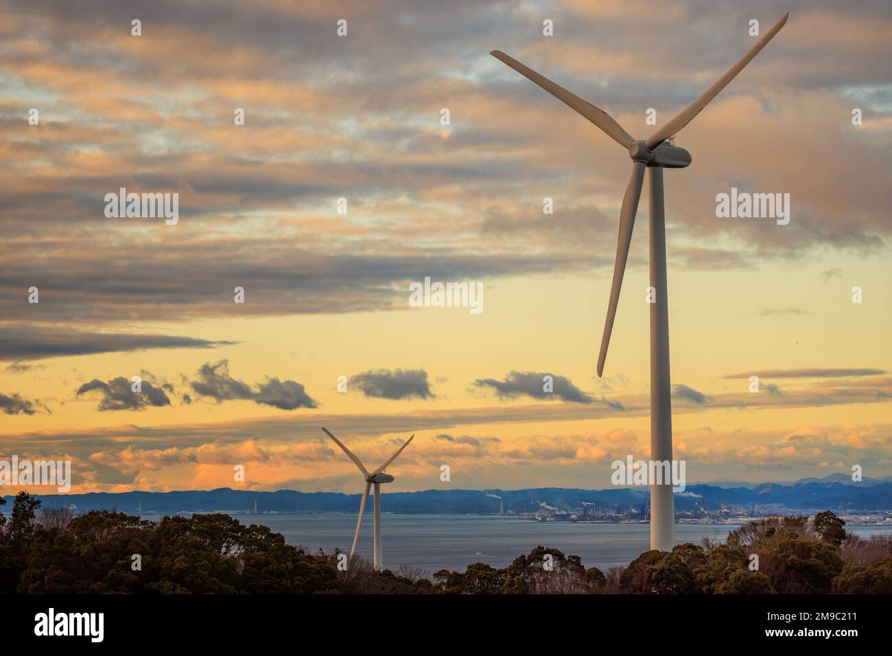 Coastal Wind Turbines Tower above Sea with Dramatic Sunset Sky Stock ...