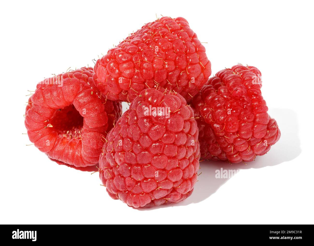 Ripe red raspberry on a white isolated background Stock Photo - Alamy