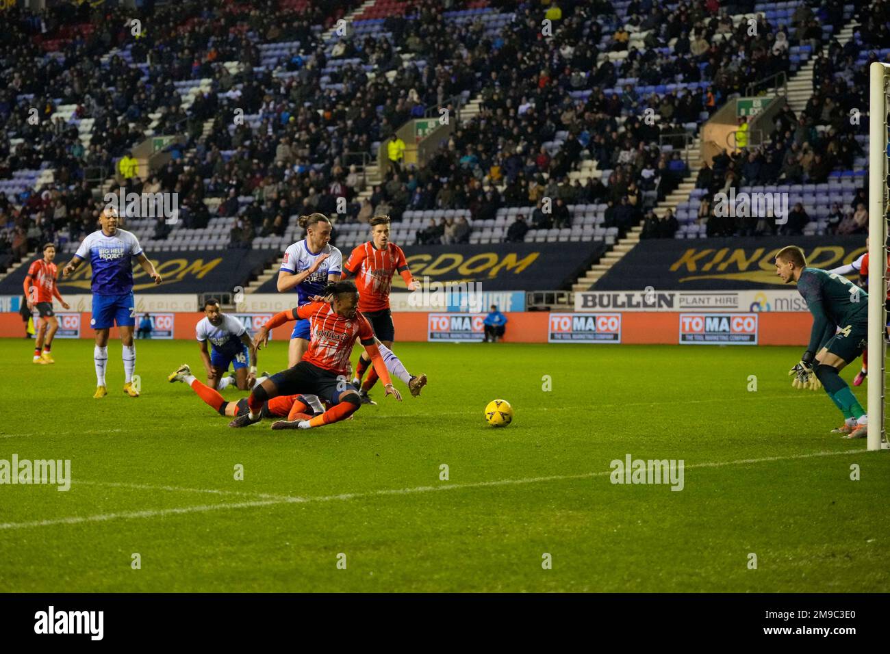 Will Keane #10 of Wigan Athletic shoots in the Luton Town penalty box ...