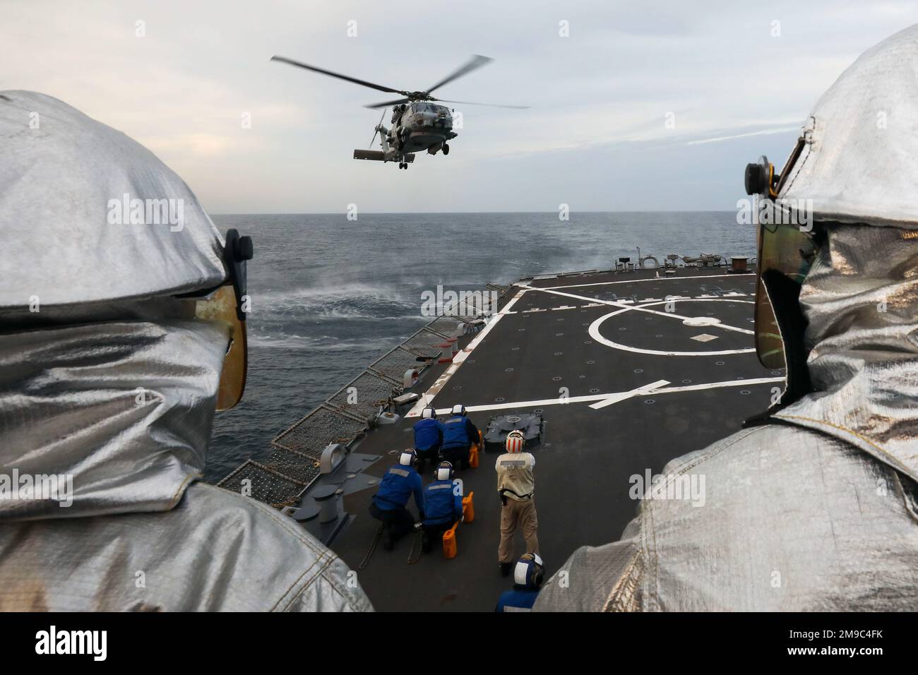 PHILIPPINE SEA (May 15, 2022) An MH-60R helicopter assigned to USS ...
