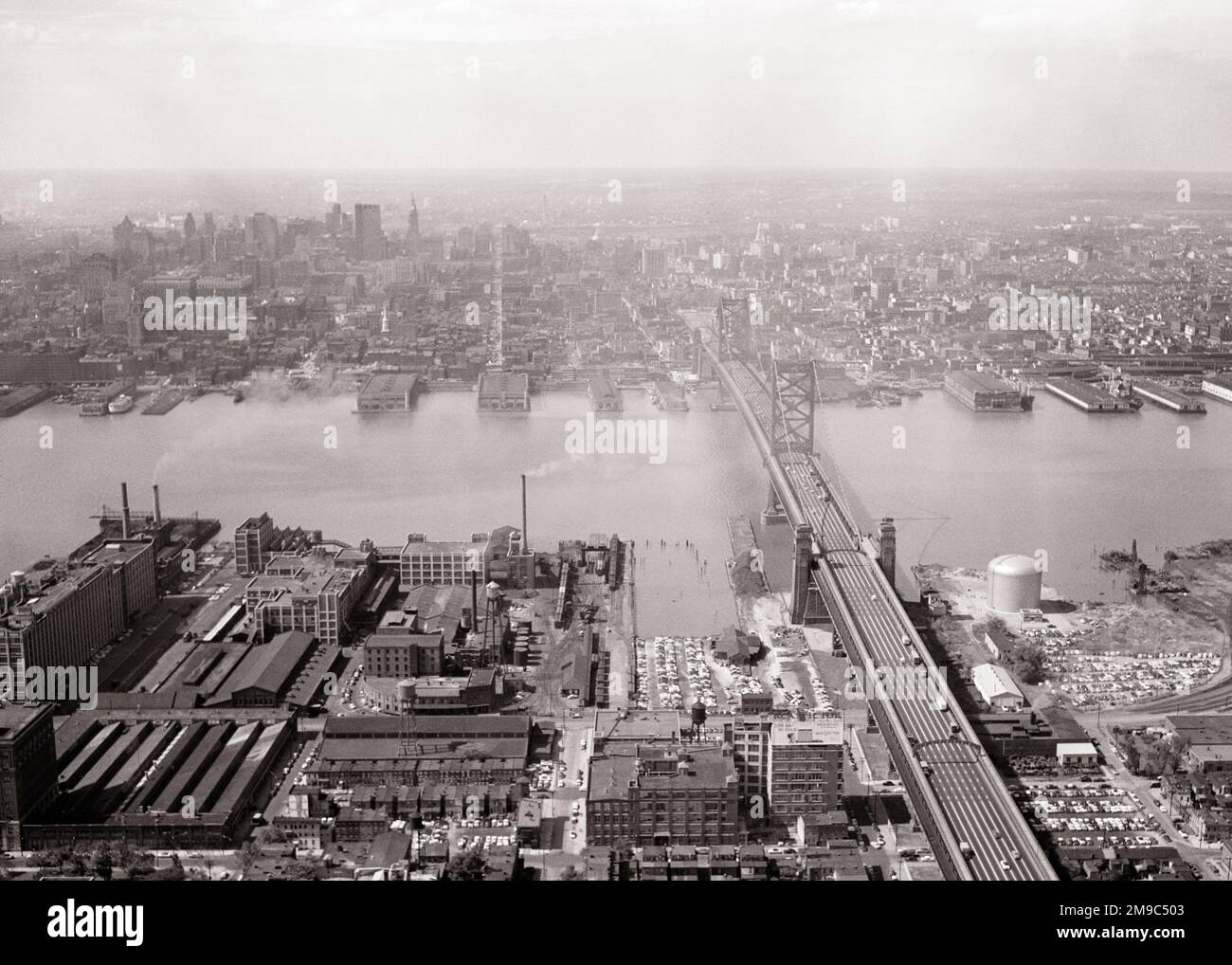 1950s 1960s AERIAL DELAWARE RIVER BEN FRANKLIN BRIDGE LOOKING WEST PAST ...