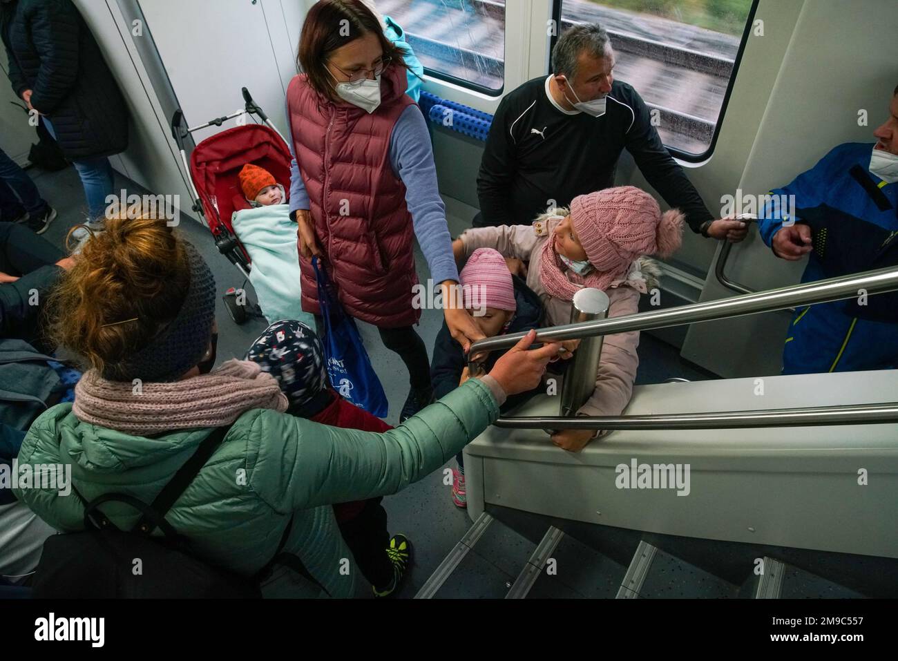 17-09-2022 Bavaria, Germany. The train in Bavaria - some in masks, some ...