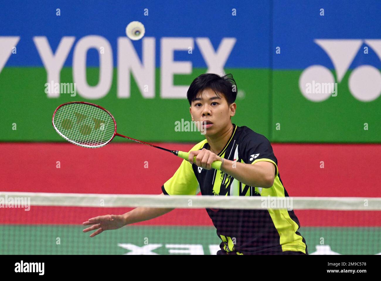 NEW DELHI, INDIA - JANUARY 17: Thailand badminton player Supanida Katethong plays a shot during ...