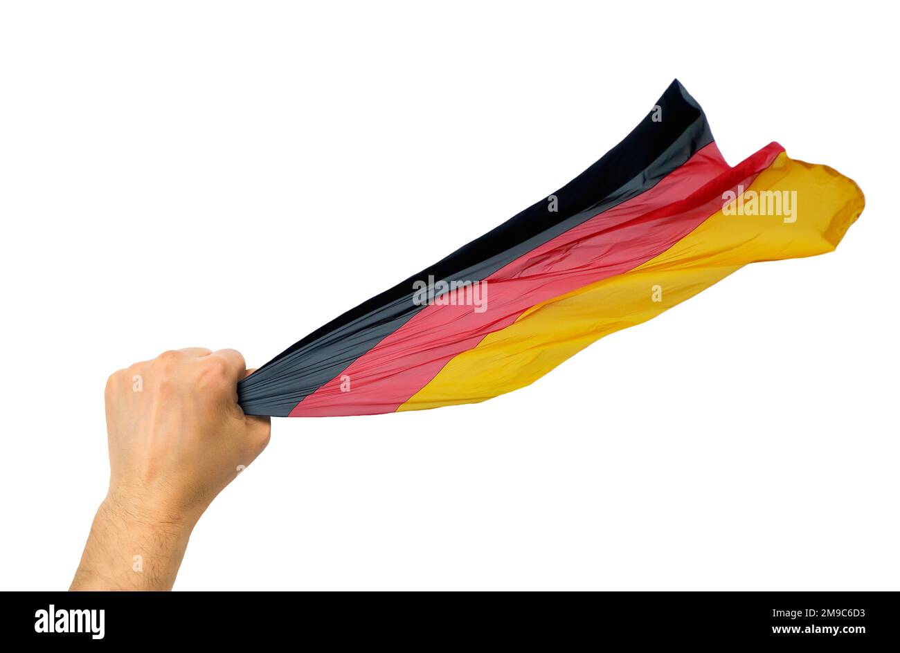 German fan holding the flag of Germany isolate with white background ...