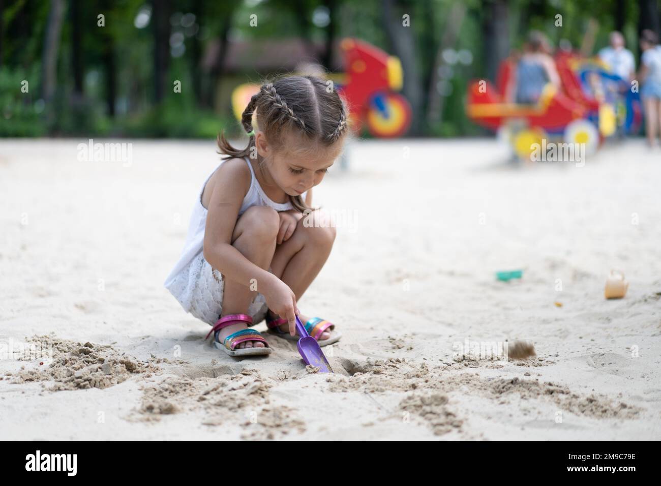 Little Girl Playing Sandbox Playground Digging Sand Shovel Building ...
