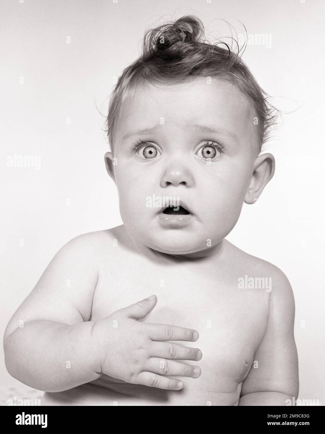 Baby looking amazed awe hi-res stock photography and images - Alamy