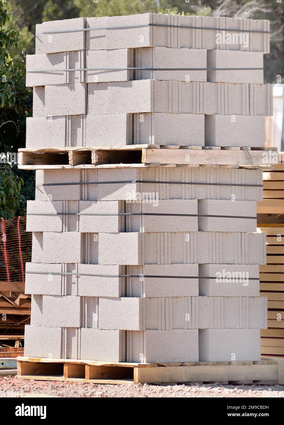 Pile of white bricks at a construction site - building material ...