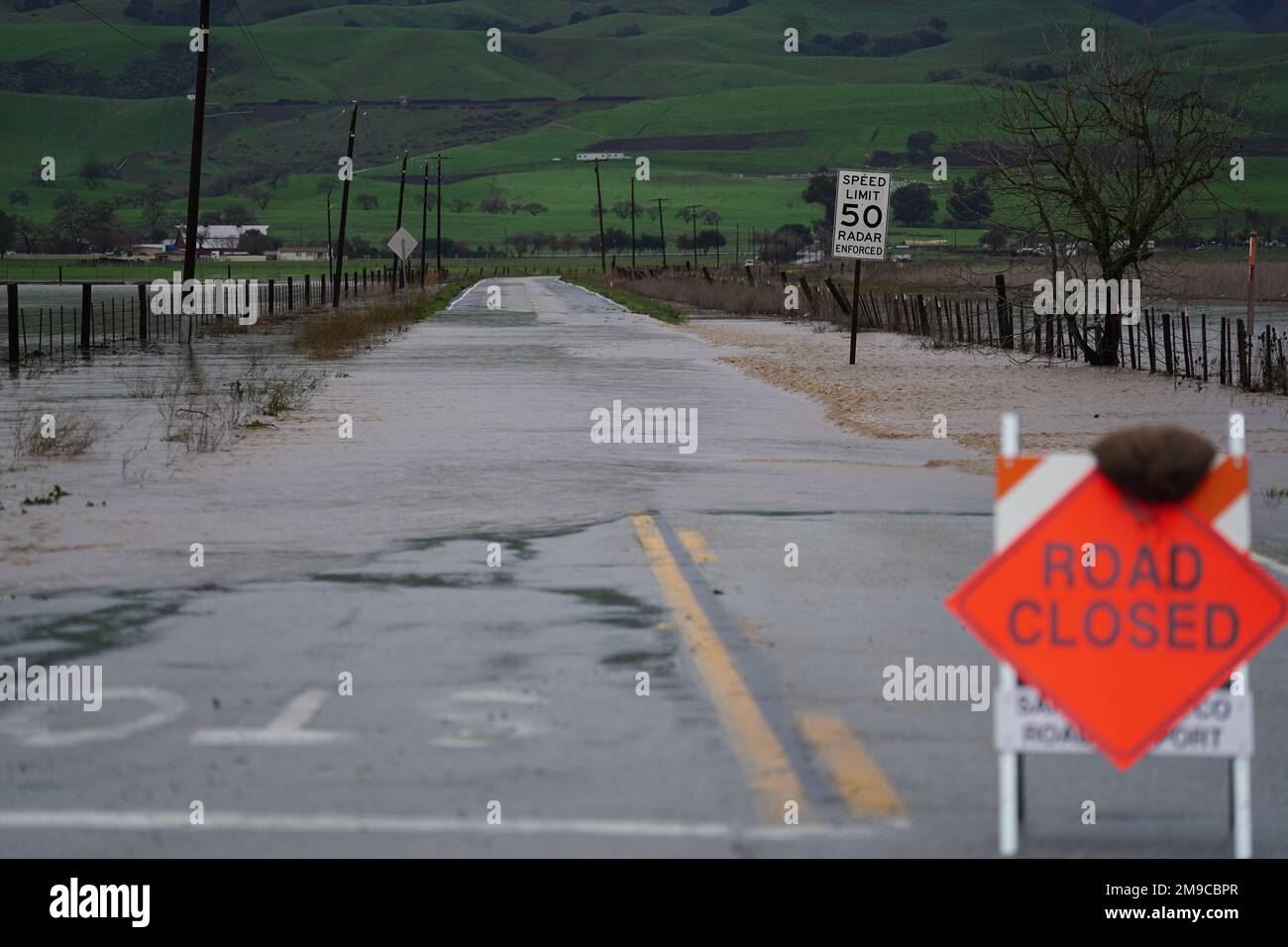 The road in Gilroy was closed since flooding. Powerful storm systems ...