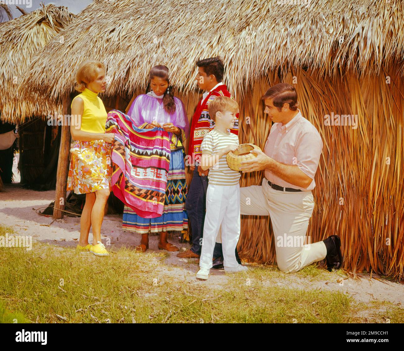 1960s 1970s TOURIST FAMILY VISITING SEMINOLE VILLAGE TALKING WITH ...