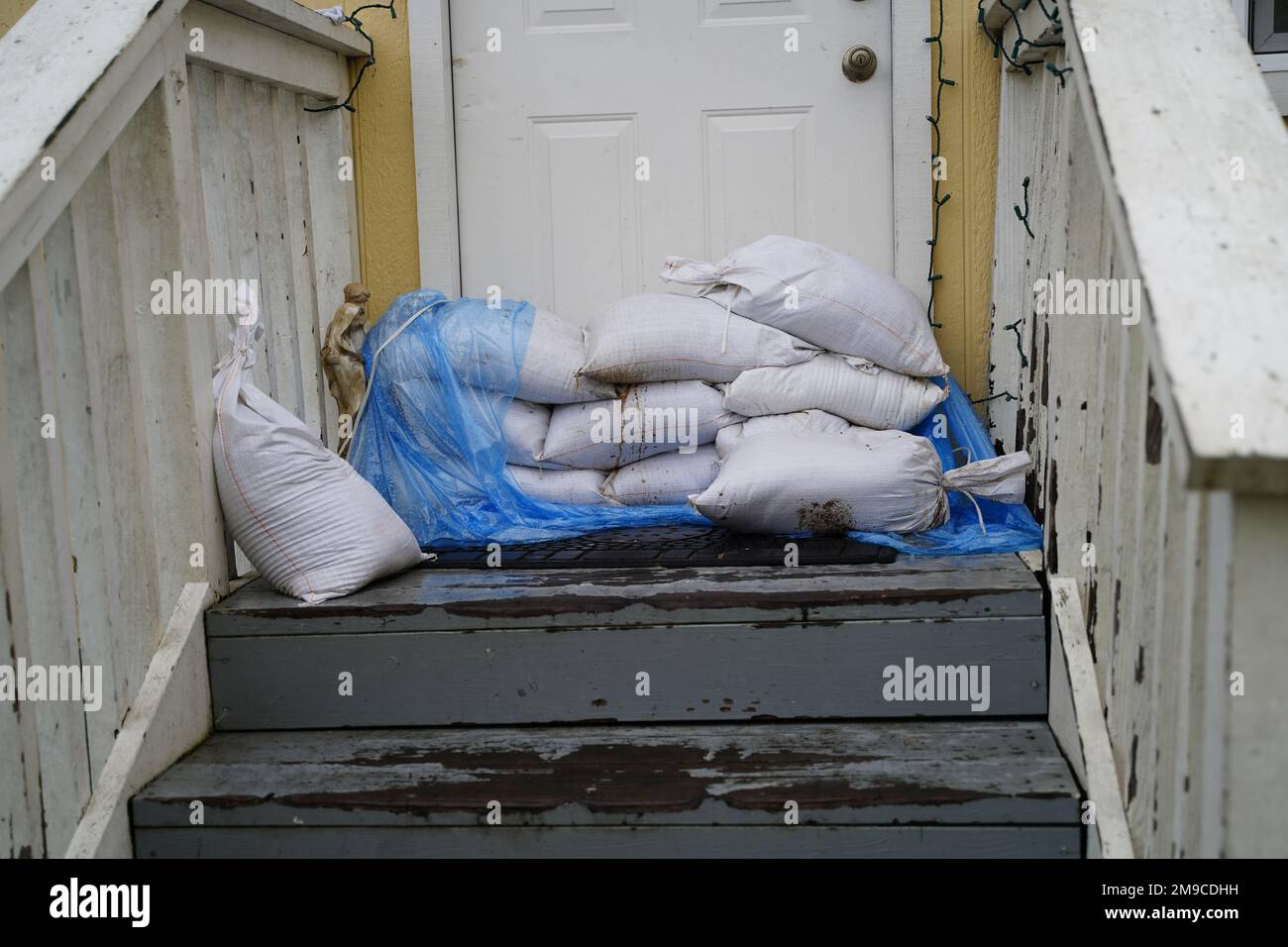 People put sandbag outside their houses to avoid flooding. Powerful ...