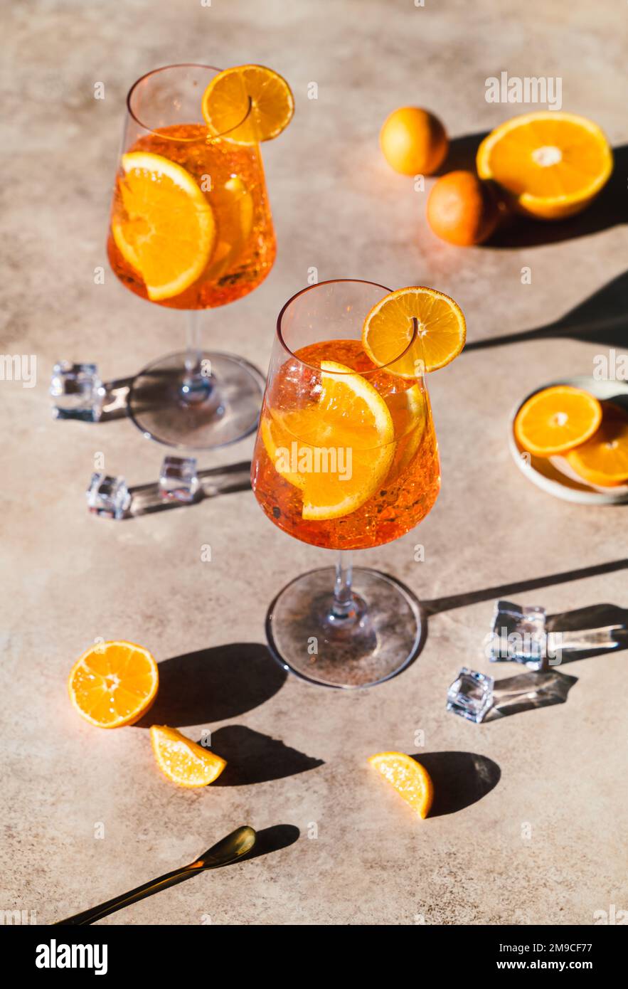 Close up of two aperol spritz drinks on sunny beige background Stock ...
