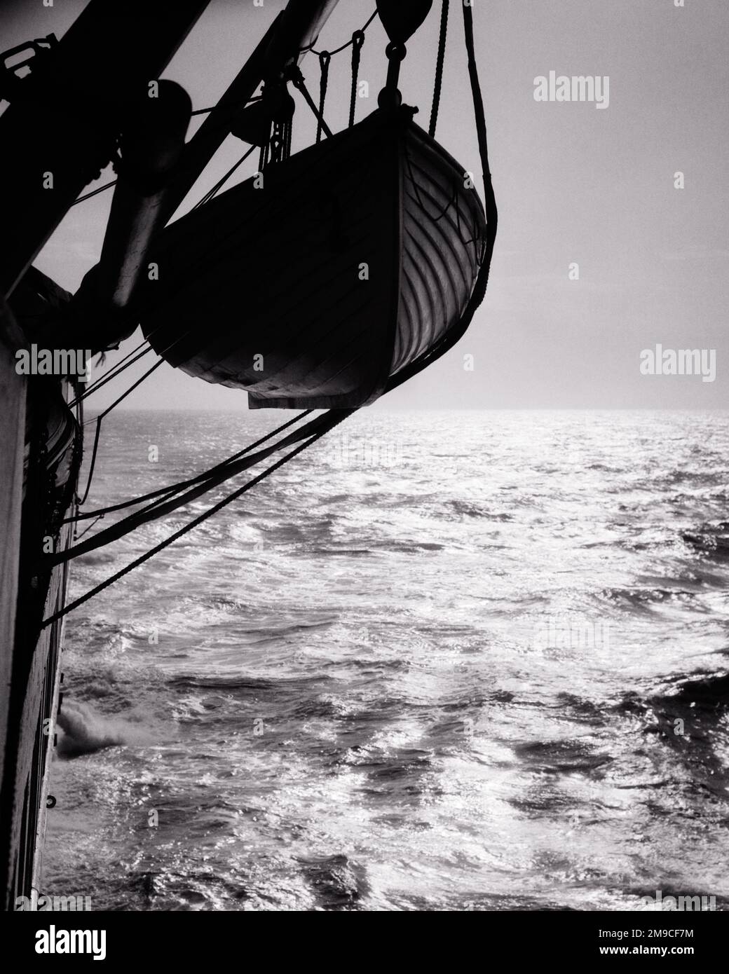 1920s SHIP’S LIFEBOAT SUSPENDED BY DAVITS FOR USE IN EMERGENCY - m2839 ...