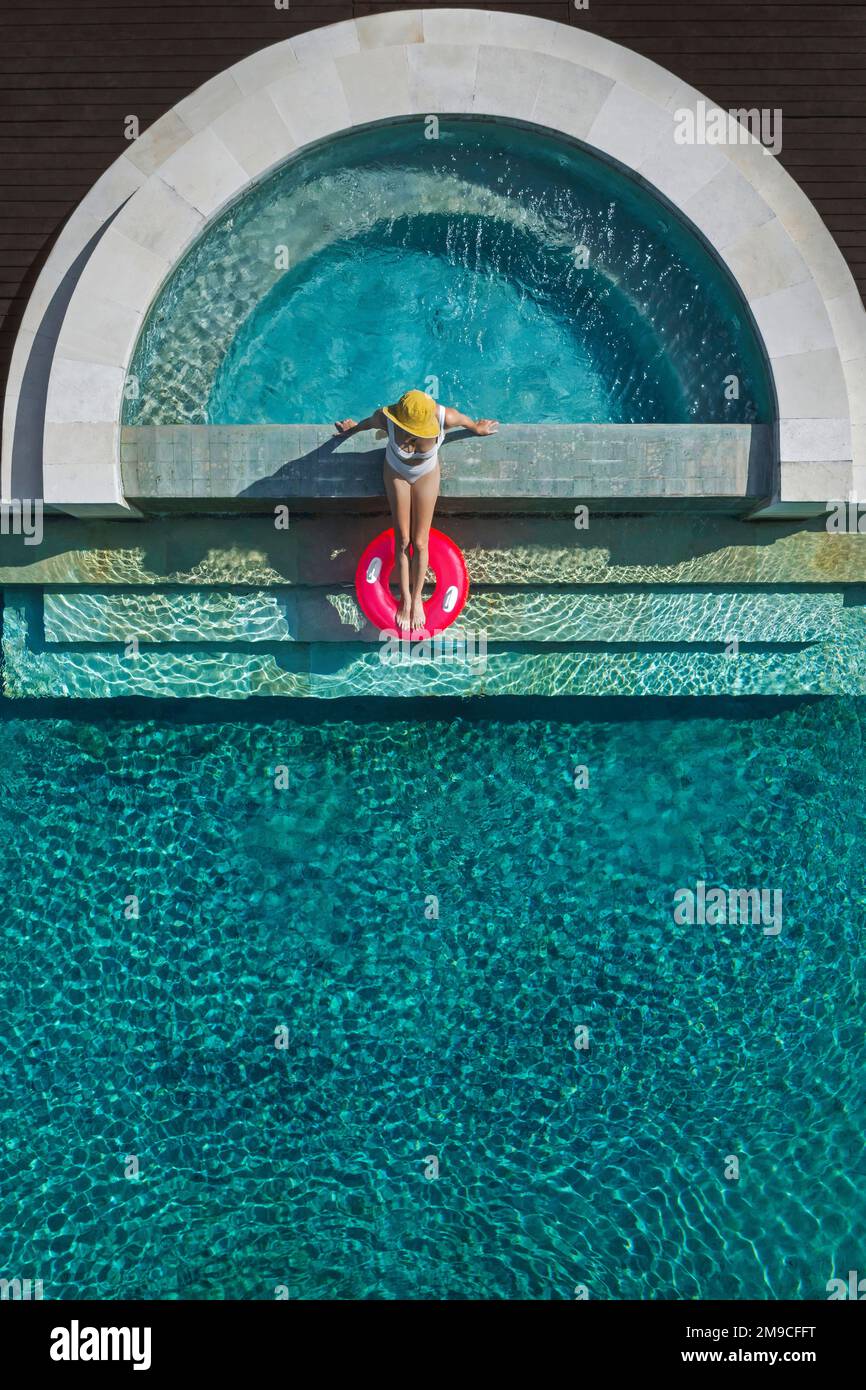 Aerial view of woman in swimming pool Stock Photo - Alamy
