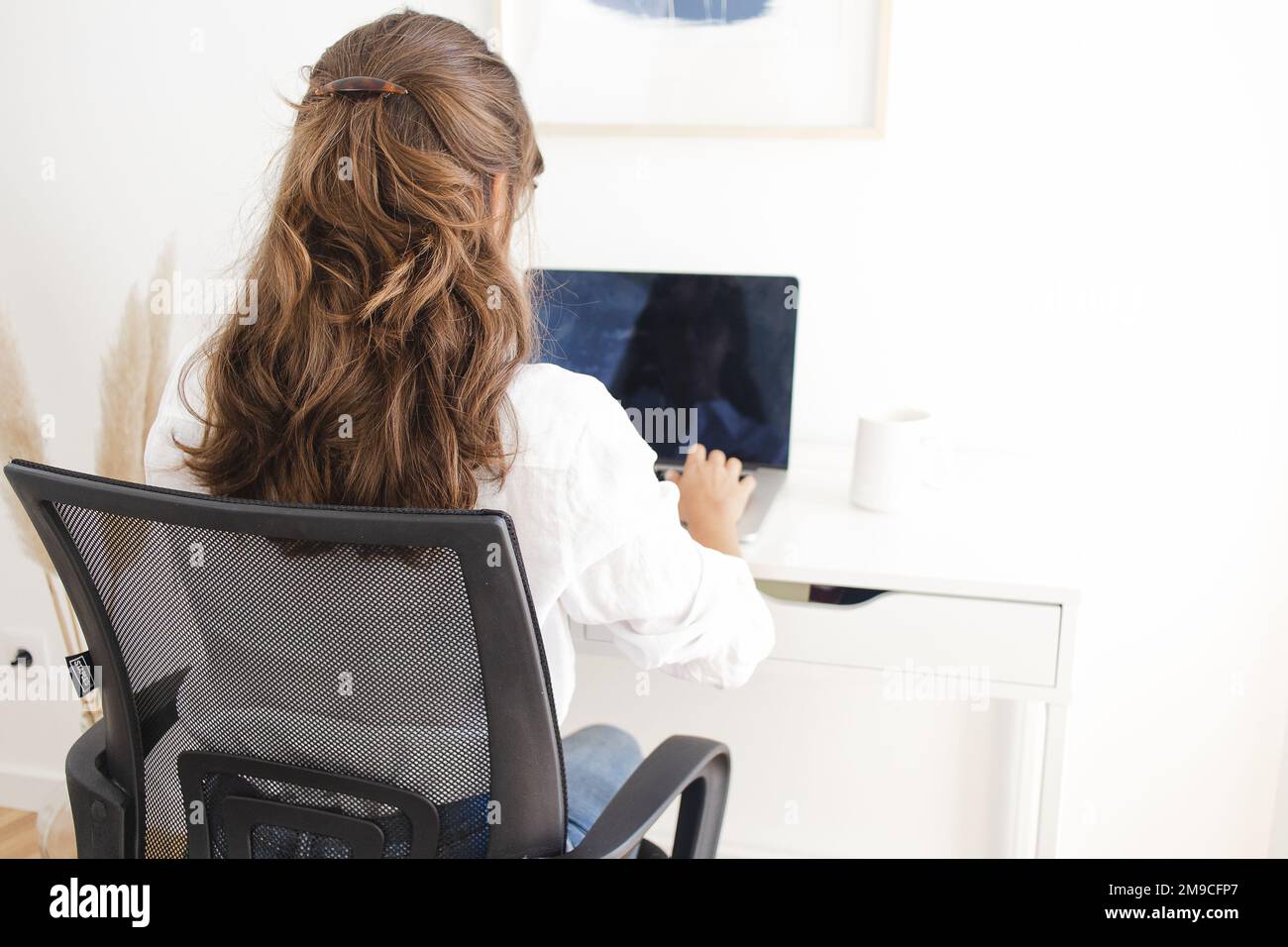 Woman Working from Home Office on her Desk Stock Photo - Alamy
