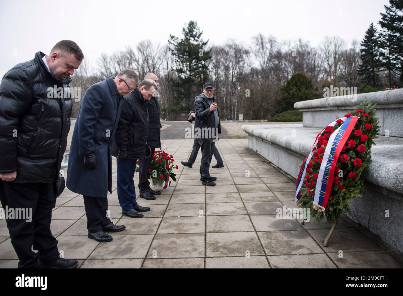 The Russia's ambassador to Poland, Sergey Andreev pays respect at the Soviet soldiers cemetery ...