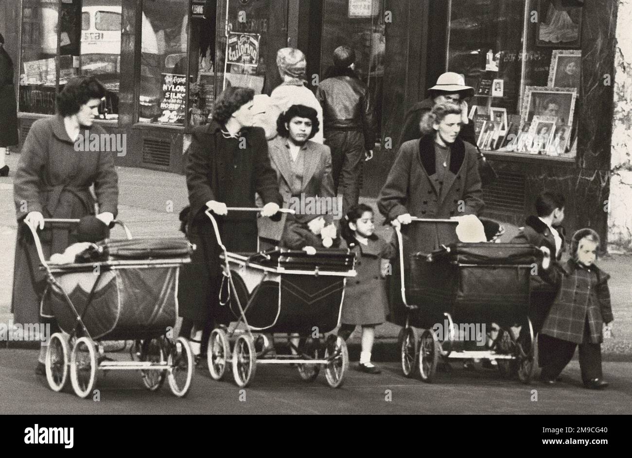 Three Women pushing Baby Strollers across Street, New York City, New ...