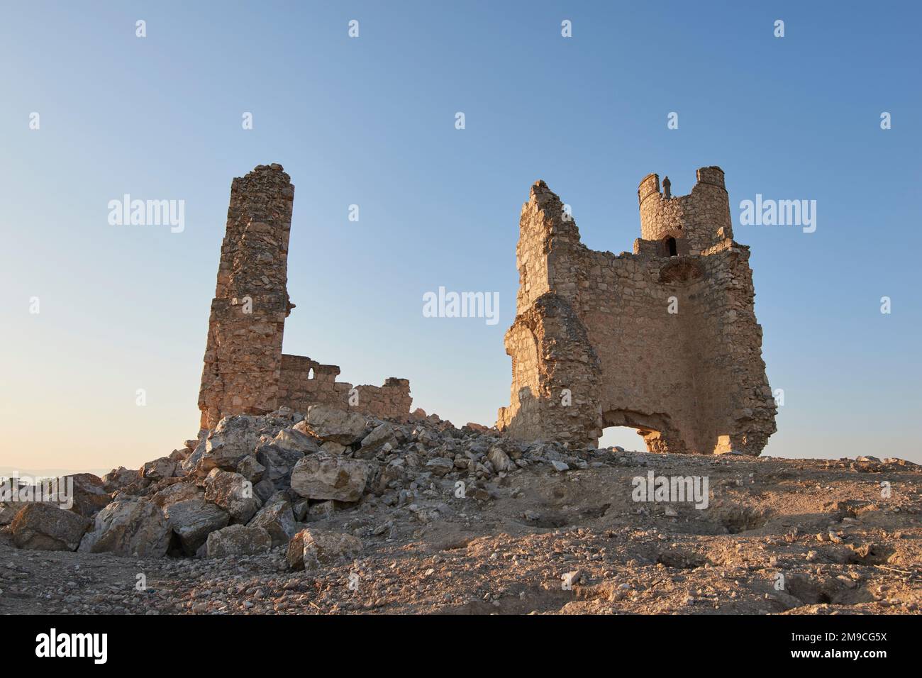 Caudilla castle in a sunny field at sunset.Toledo, Spain Stock Photo ...