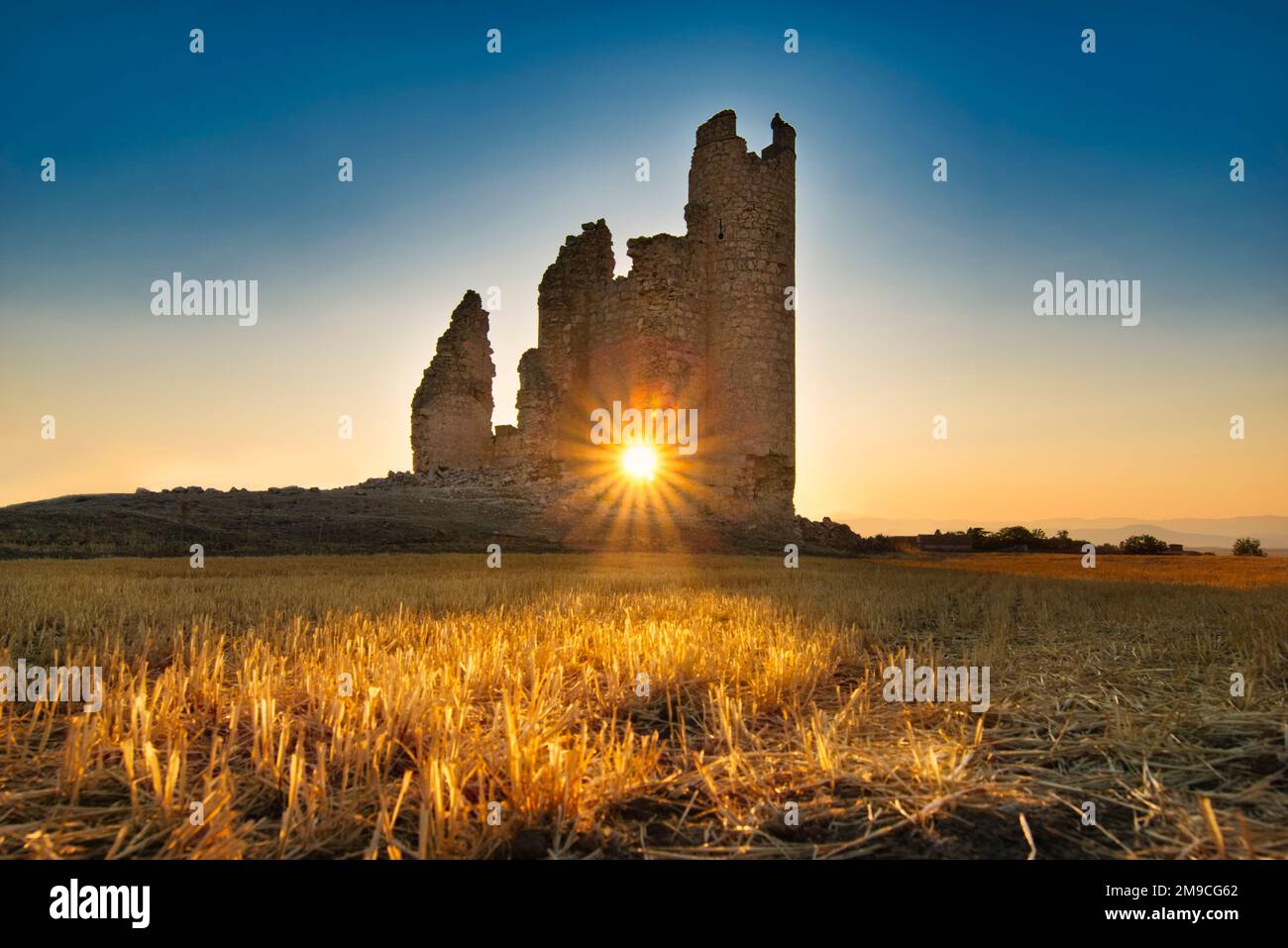 Caudilla Castle with sun rays at sunset. Toledo, Spain Stock Photo - Alamy