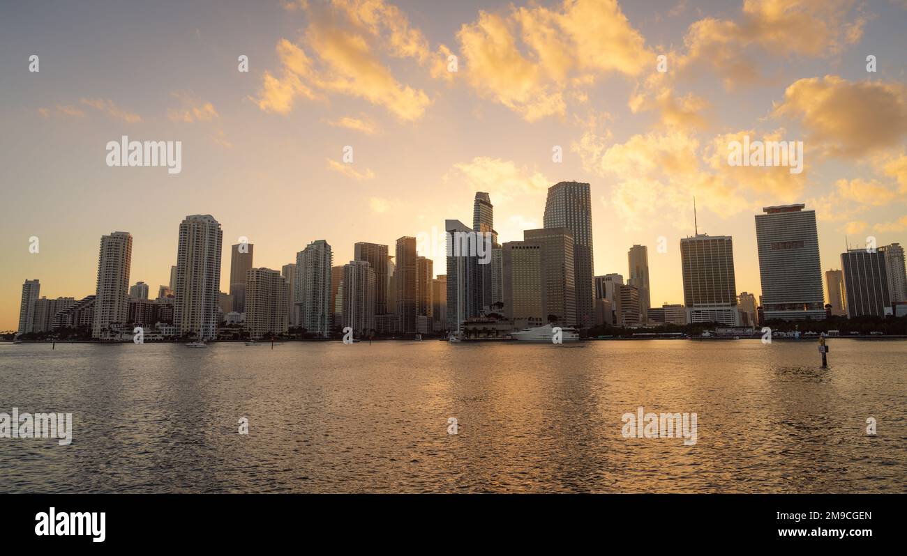 sunset over the city sun clouds life miami views Stock Photo - Alamy
