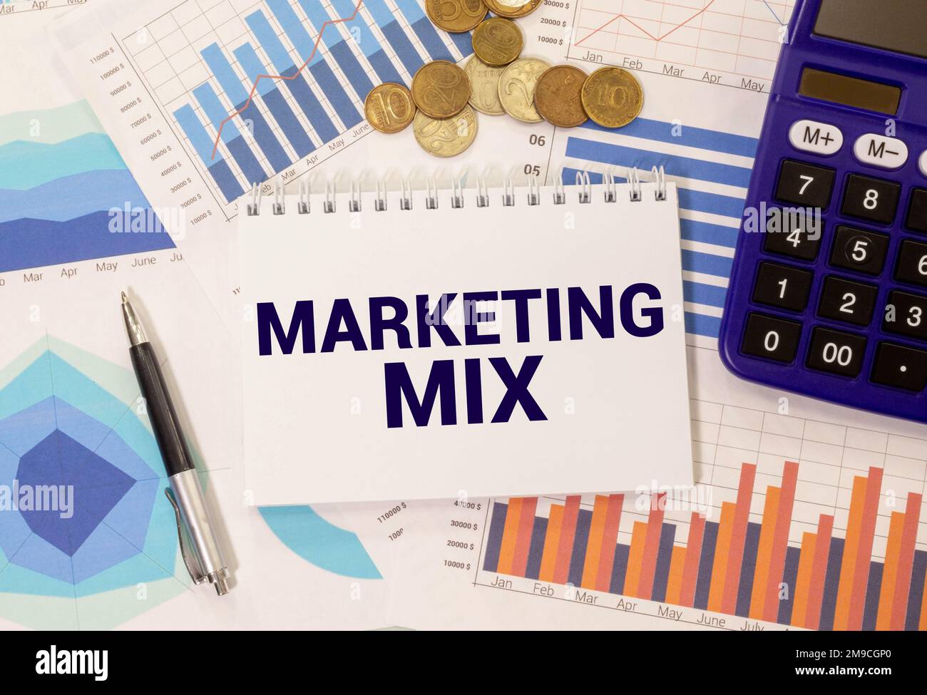 white paper with text MARKETING MIX on a white background with ...