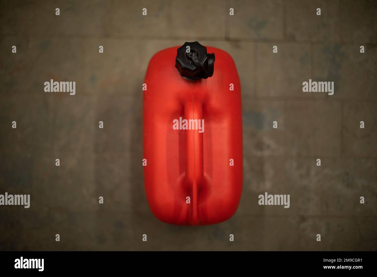 Red canister of fuel. Liquid container. Red plastic Stock Photo - Alamy