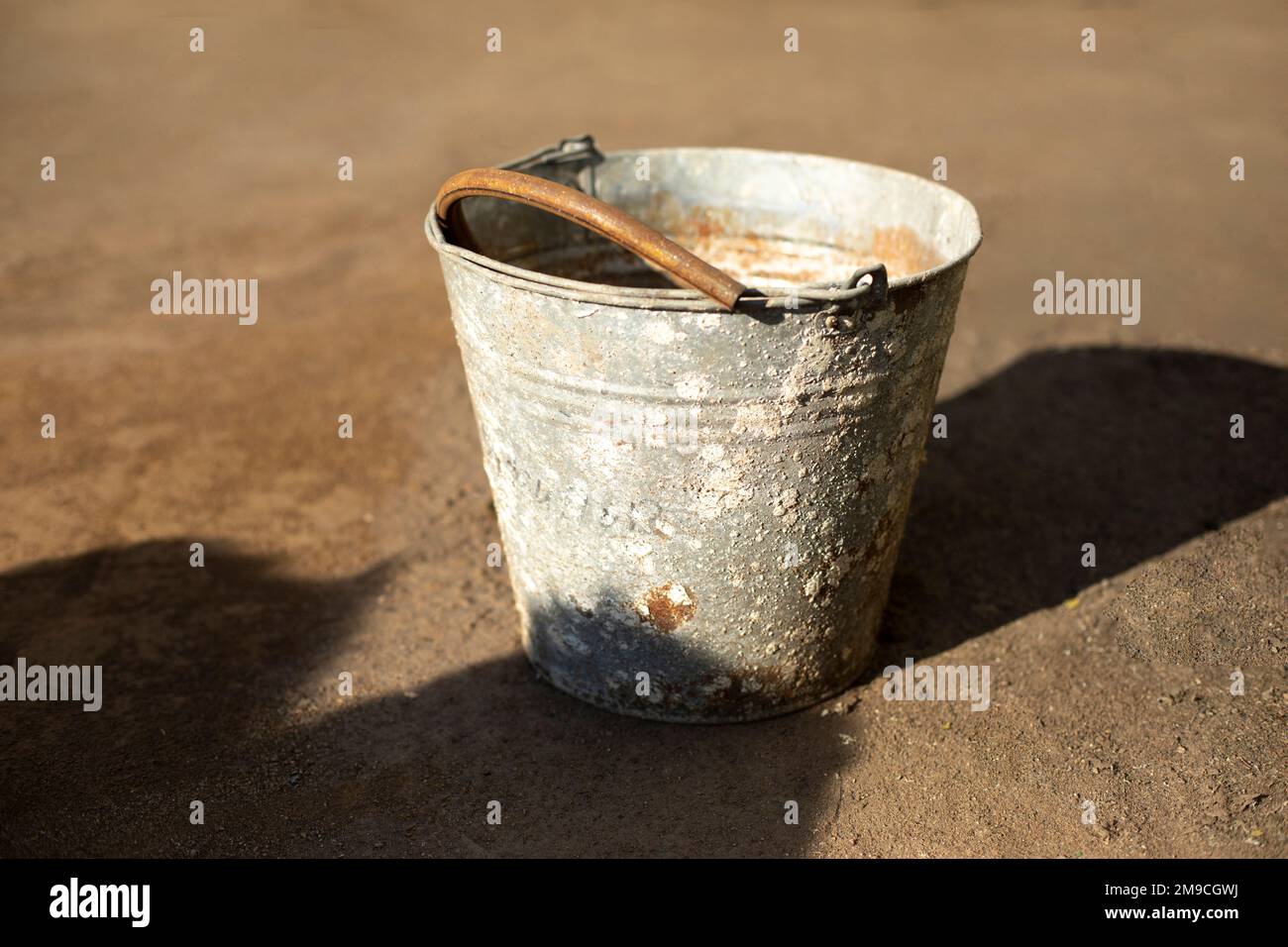 Old bucket outside. Rusty object. Spoiled metal Stock Photo - Alamy