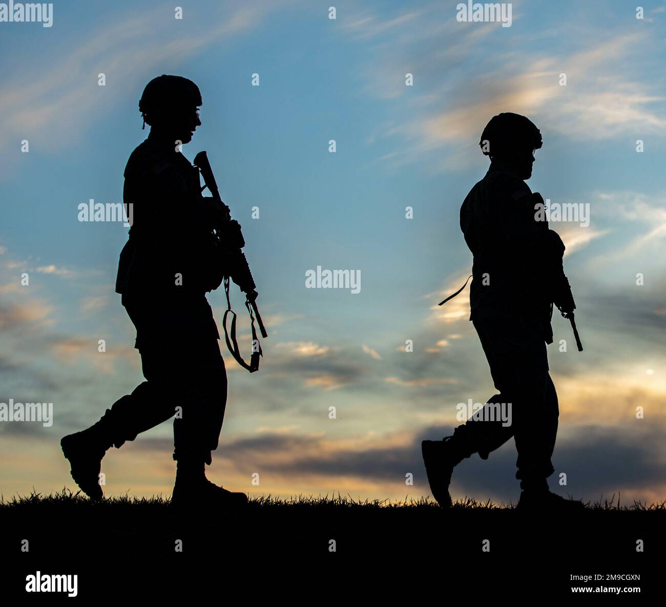 Army Reserve Best Squad Competitors walk down a range during the Best ...
