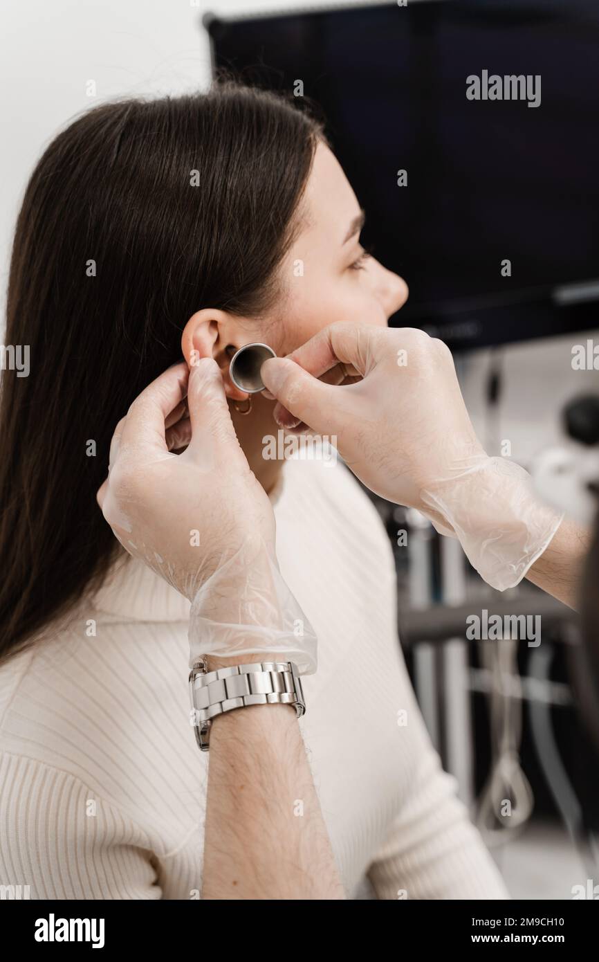 Hearing woman funnel hi-res stock photography and images - Alamy