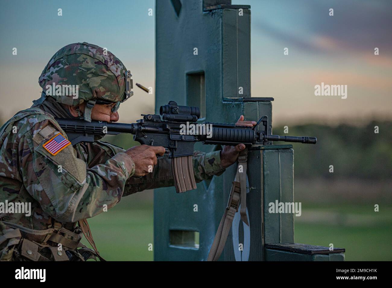 Army Reserve Sgt Joshua Tsang, 311th Signal Command, fires the M4 ...