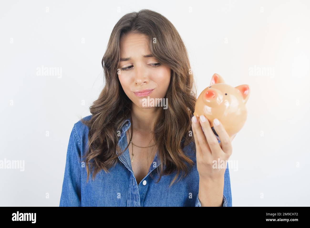 Old woman holding money in hi-res stock photography and images - Alamy