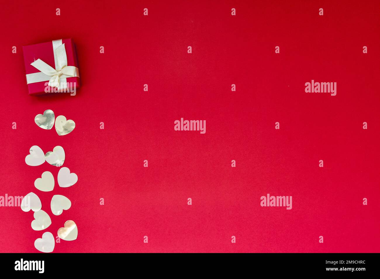 Hearts of paper on red textured background. San Valentine day concept ...