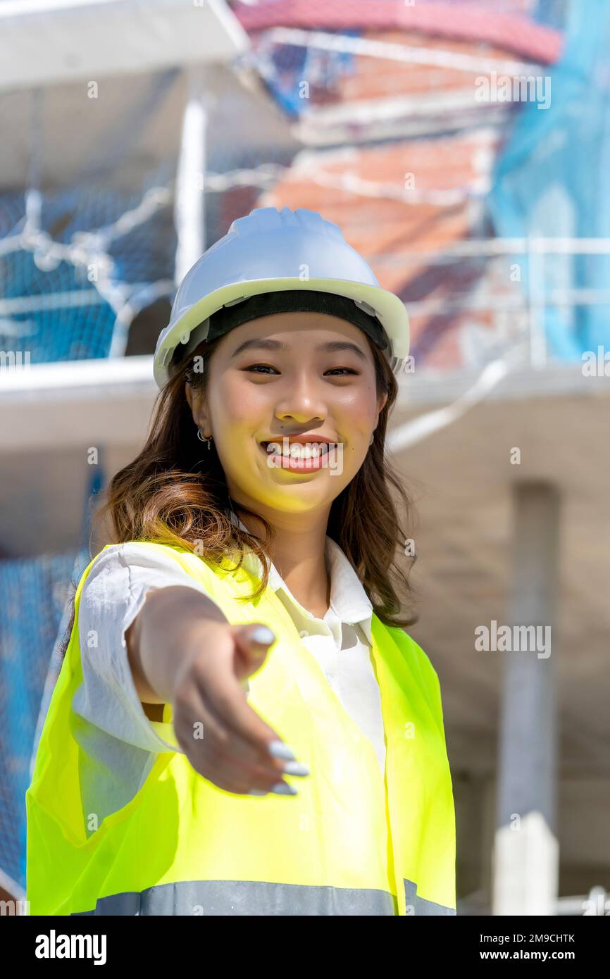 young female architect visiting her work Stock Photo - Alamy