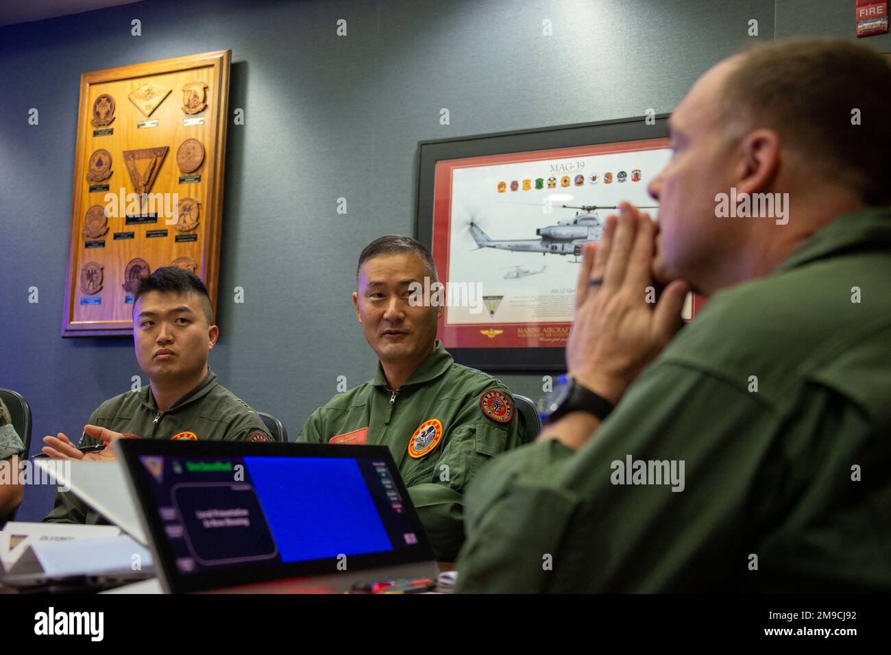 Republic of Korea Marine Col. Ji Eunkoo, center, speaks with U.S ...