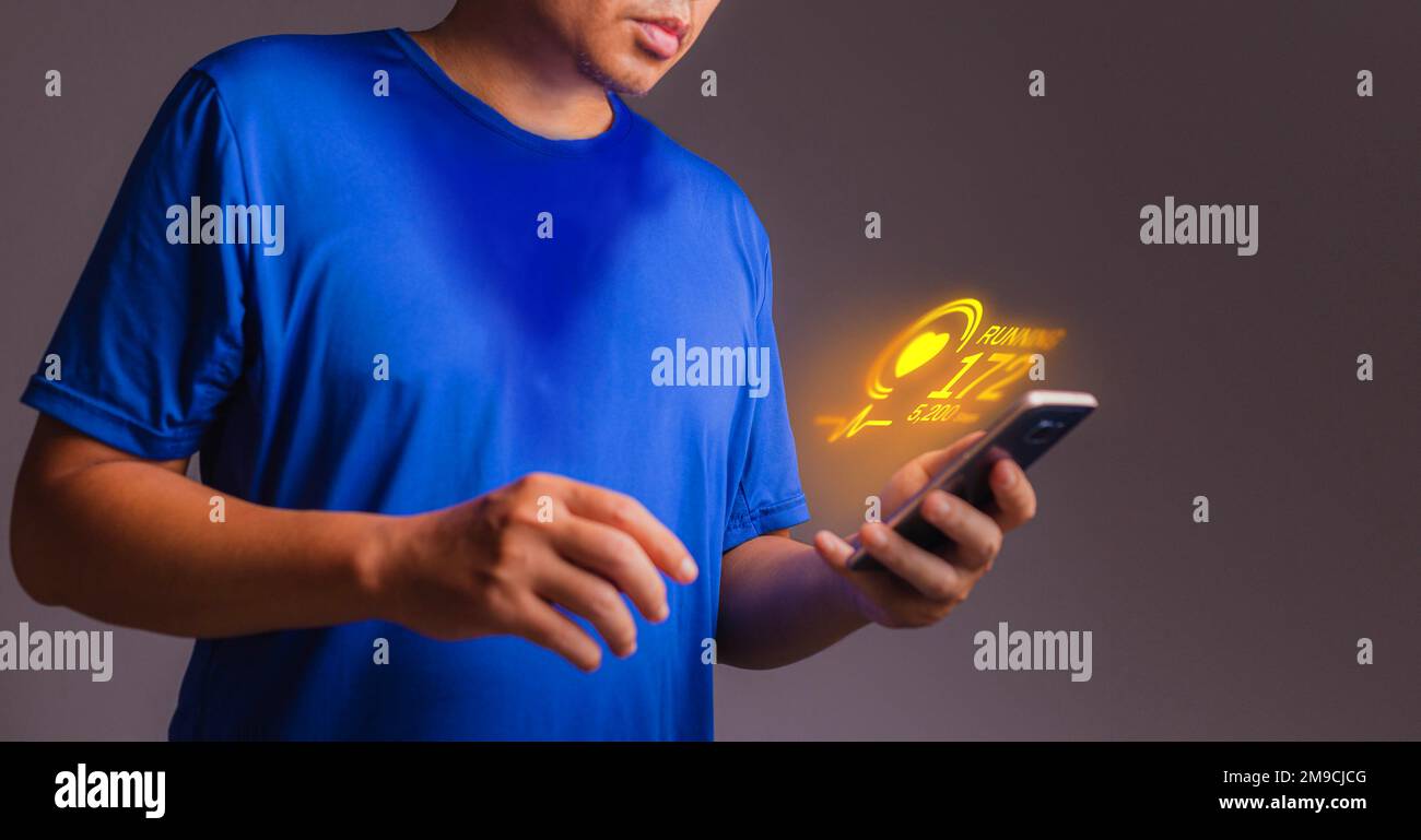 Exercise app on smart phone in hand. Concept hologram of Exercise ...