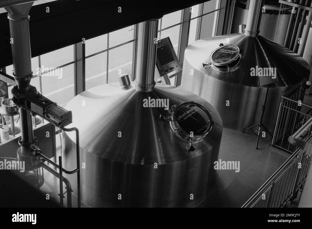 Brewing beer in tank process Black and White Stock Photos & Images - Alamy