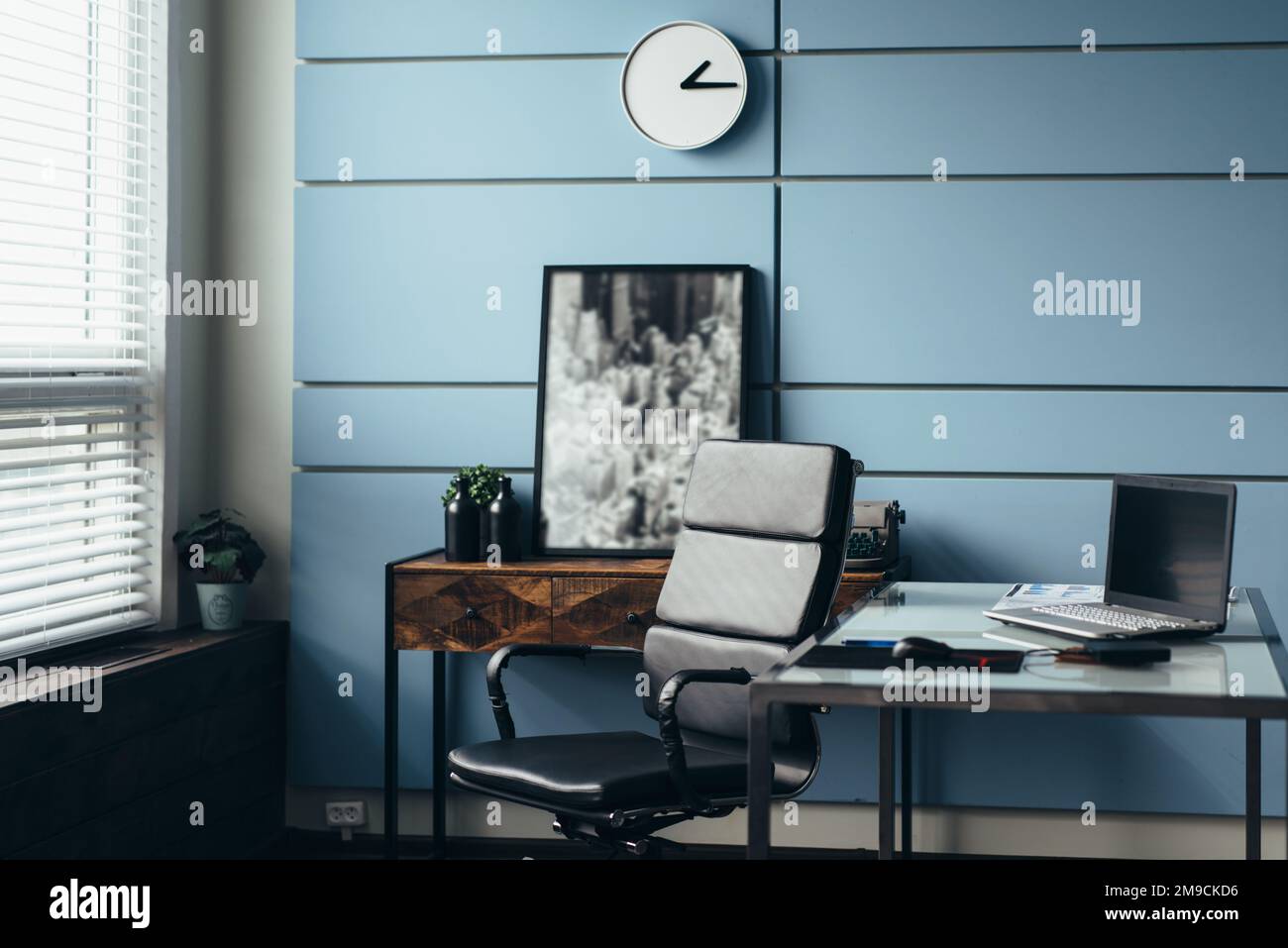 Workplace in office with laptop on desk no people Stock Photo - Alamy