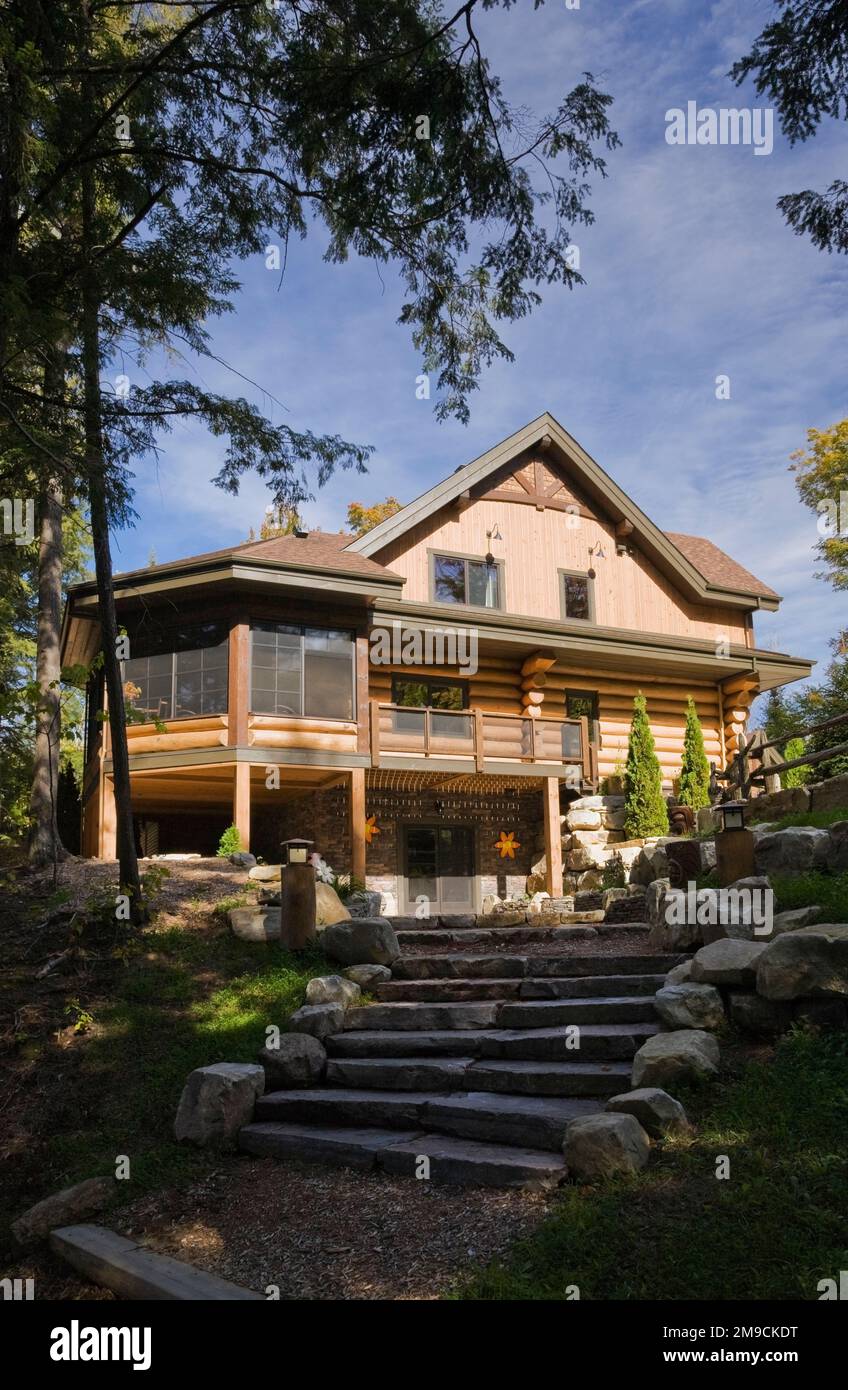 Luxurious Scandinavian log and timber style home with natural stone ...