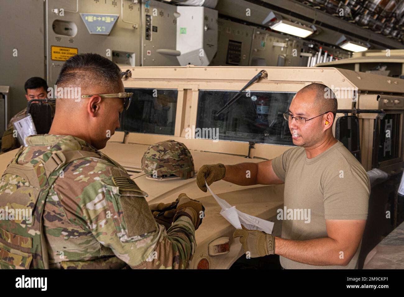 A U.S. Air Force Tech. Sgt. Andrew Fukuda, a load planner assigned to ...