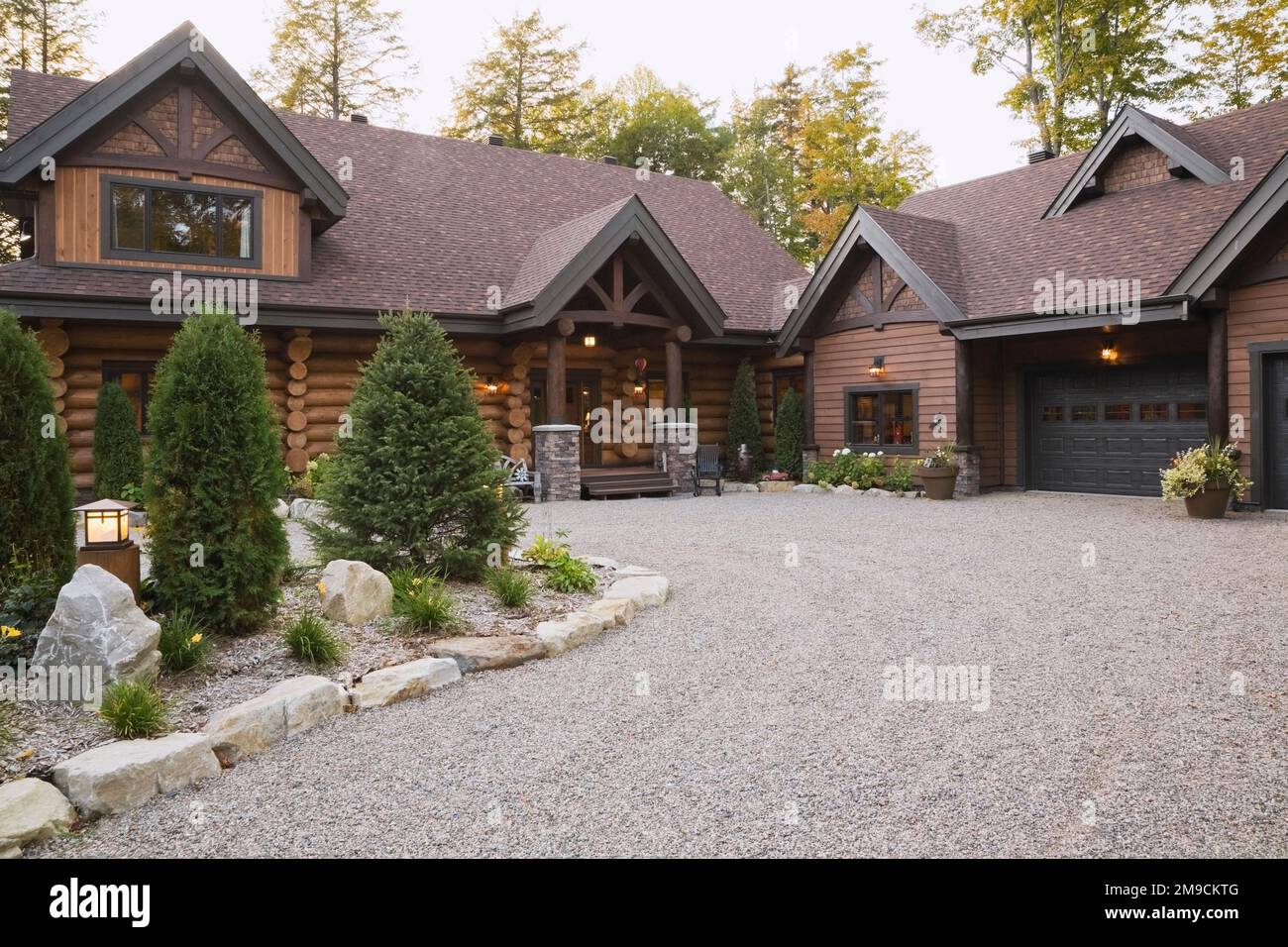 Luxurious Scandinavian log and timber style home with brown nuanced ...