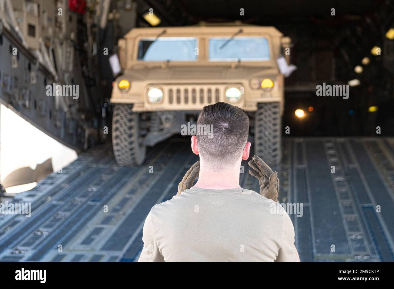 A U.S. Air Force loadmaster with the 816th Expeditionary Airlift ...