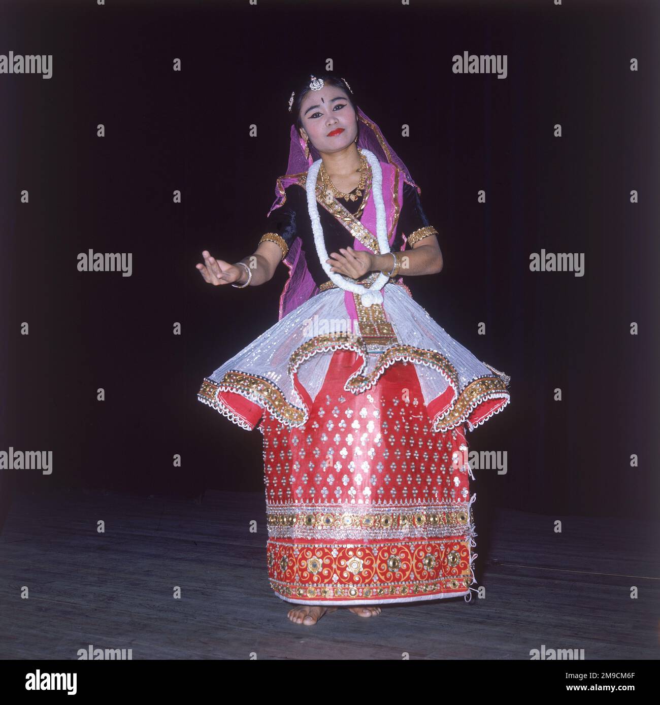 Manipuri dancer of the Assam region of India Stock Photo - Alamy