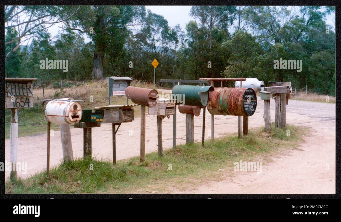 An odd assortment of mail boxes on the roadside, in Brogo, New South ...