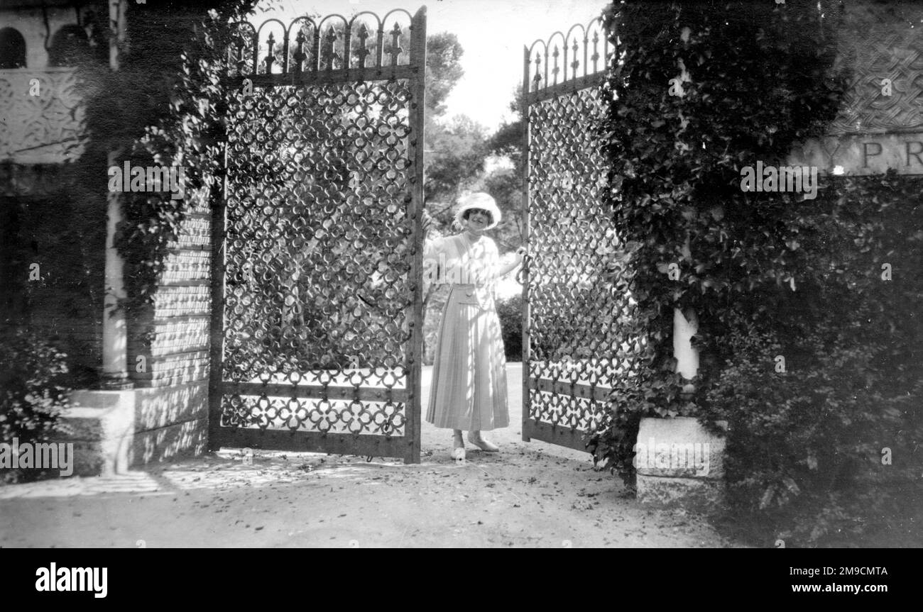 Woman opening gate Black and White Stock Photos & Images - Alamy