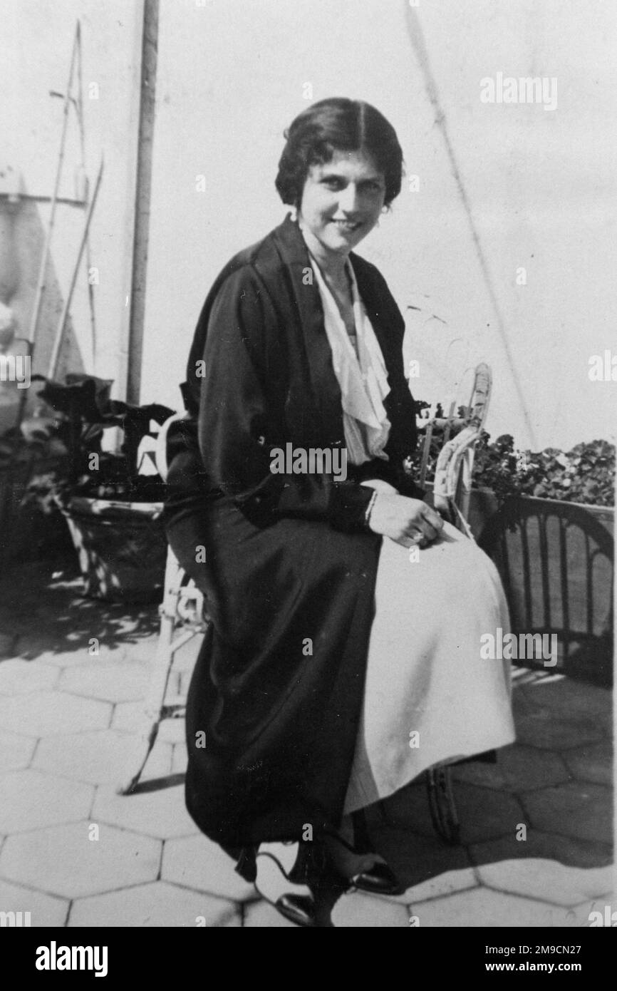 Sitting on Black and White Stock Photos & Images - Alamy