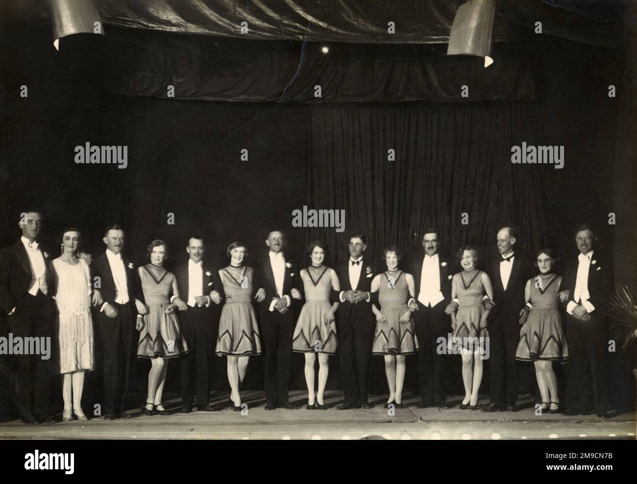 The cast of a cabaret act take a bow at the end of their performance i ...