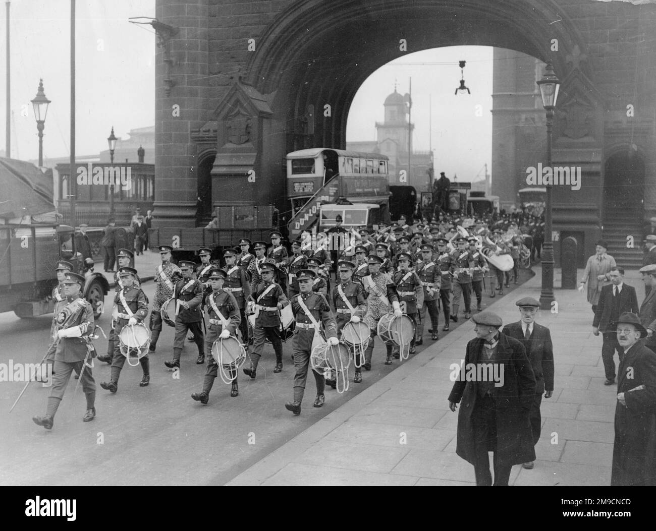 Regimental march across Tower Bridge, London Stock Photo - Alamy