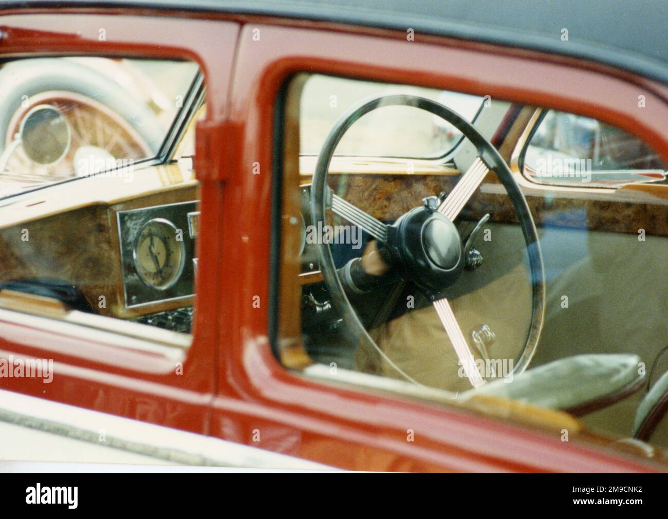 Looking into the interior of a red Riley RM saloon car (with later ...