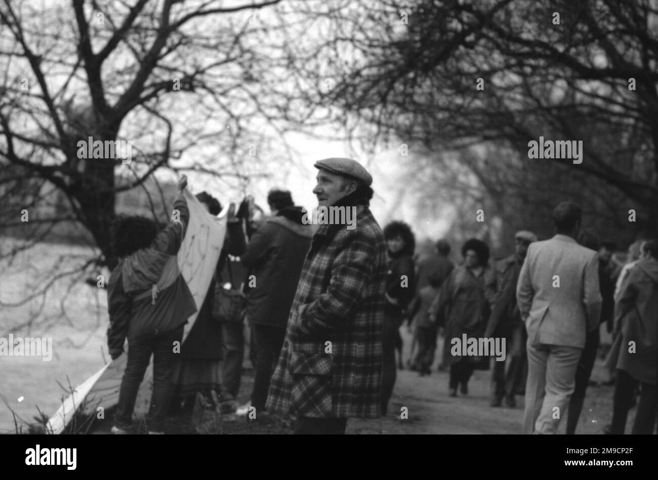 People walking in group Black and White Stock Photos & Images - Alamy