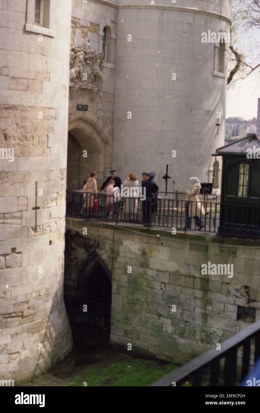 A group of people enter the Tower of London -- purely for sightseeing ...