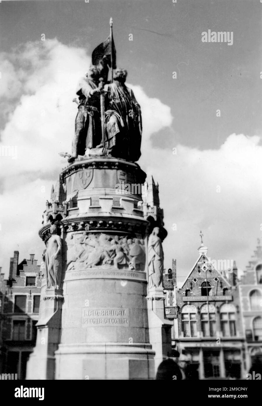 The statue of Jan Breydel in the market place in Bruges, Belgium ...